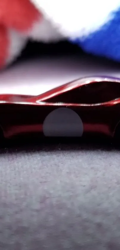 Sleek Red Toy Car Wallpaper - free download